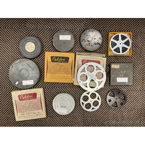 Collection of vintage military training film reels.