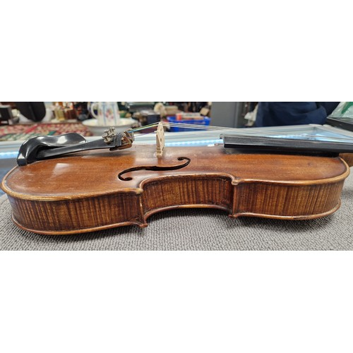 Violin and bow, cased. label inside reads 'Repaired by Jos. Millar 1913 ...