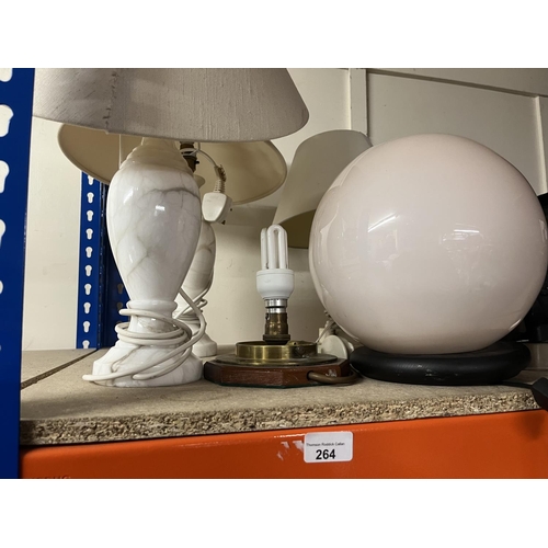Four lamps and a glass ball shape lamp.