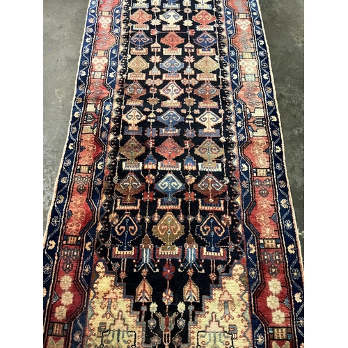 Eastern blue ground hall runner with geometric pattern and tree and ...