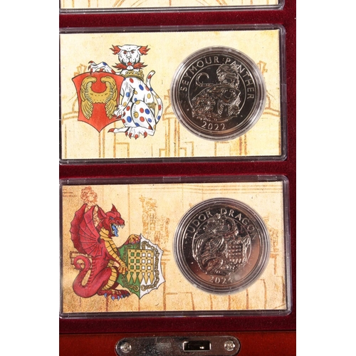 The Danbury Mint 'Royal Tudor Beast Coin Collection' comprising eight ...