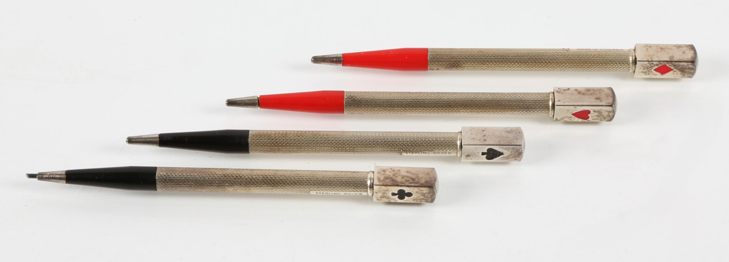 Cased set of four sterling silver Bridge pencils.