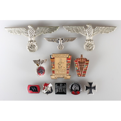 20th century Nazi German badges and insignia to include two parteiadler ...
