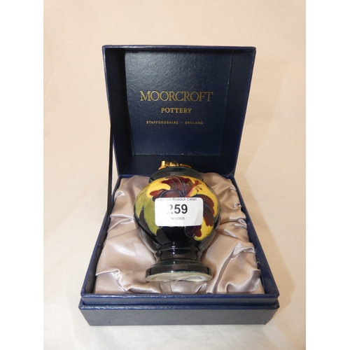 Moorcroft Hibiscus tube-lined table lighter, with fitted box.