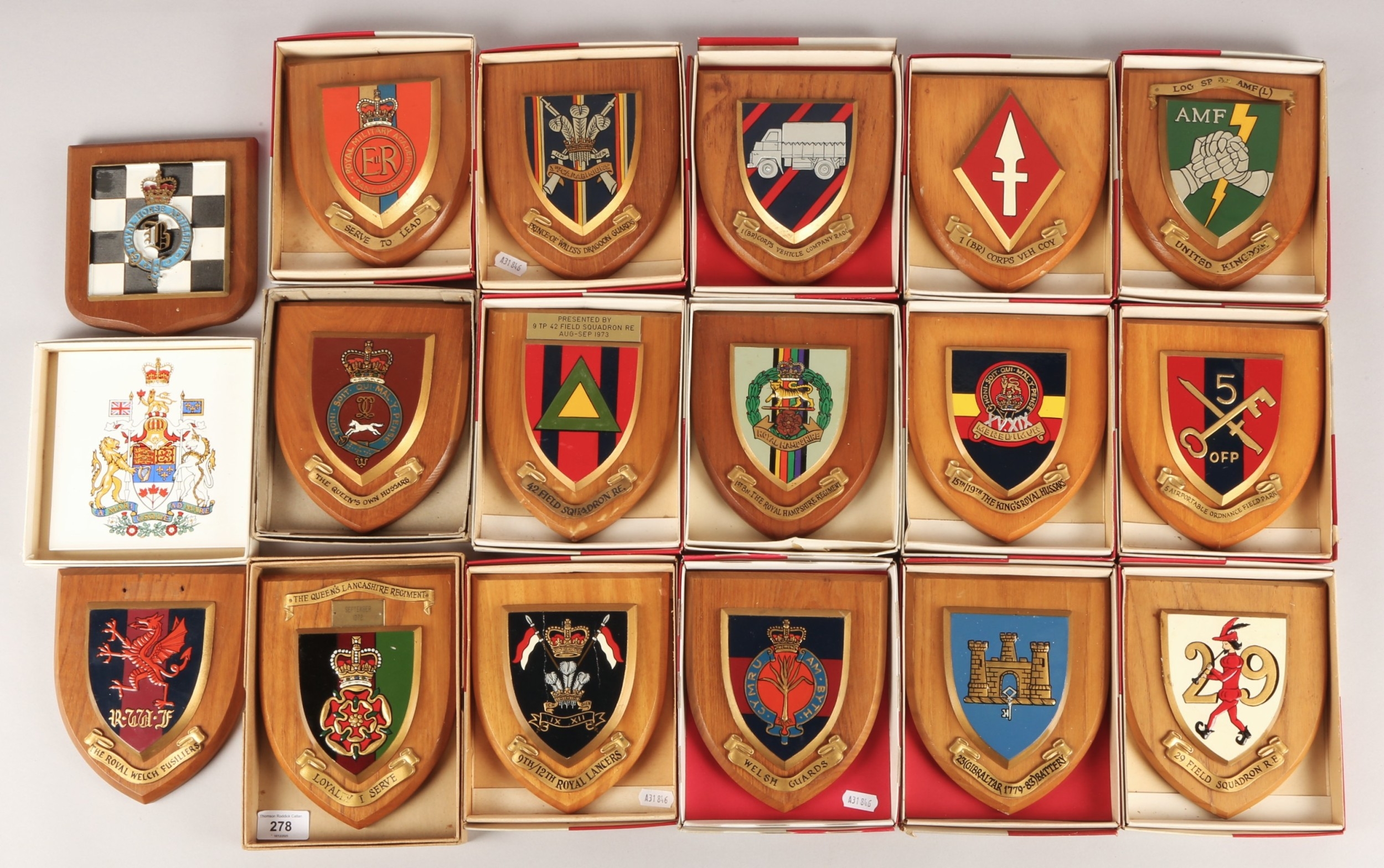 Collection of eighteen Military crest plaques.