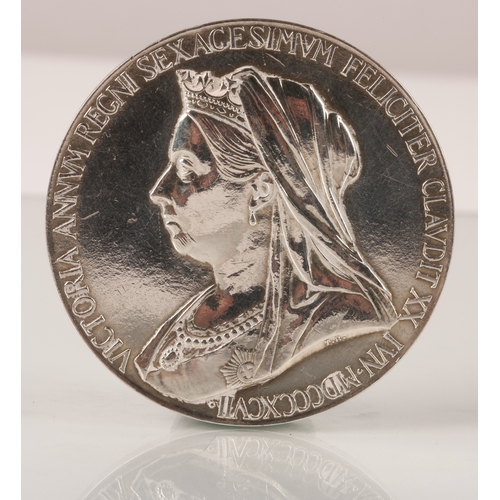 White metal Queen Victoria medallion depicting old and young heads
