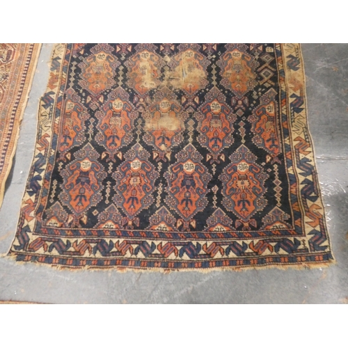 Persian hand-knotted tribal rug and a Persian Sarouk rug (both have ...