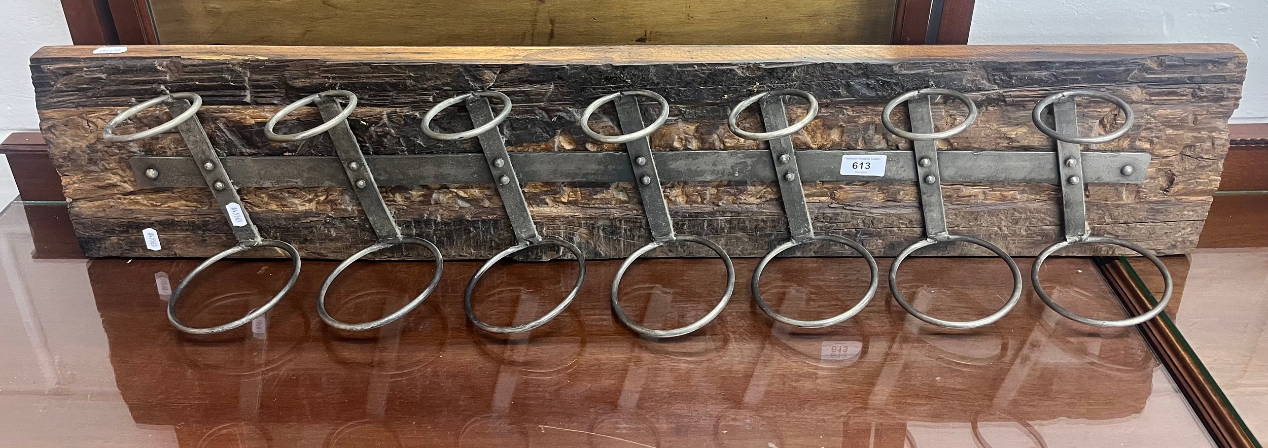 Wall-mounted wine rack.