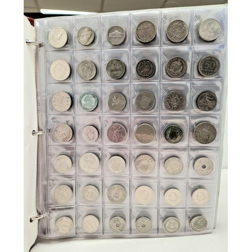 Collectors folder containing eleven sheets of world coins