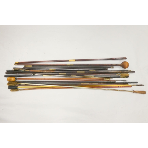 A selection of gun barrel cleaning rods, also to include ram rods and a ...