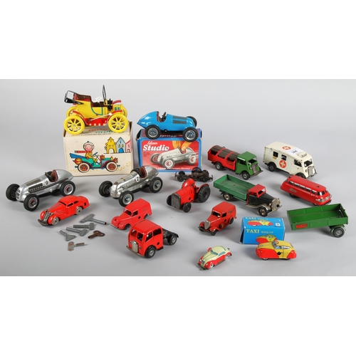 Collection of mechanical clockwork toy vehicles to include Three Schuco ...