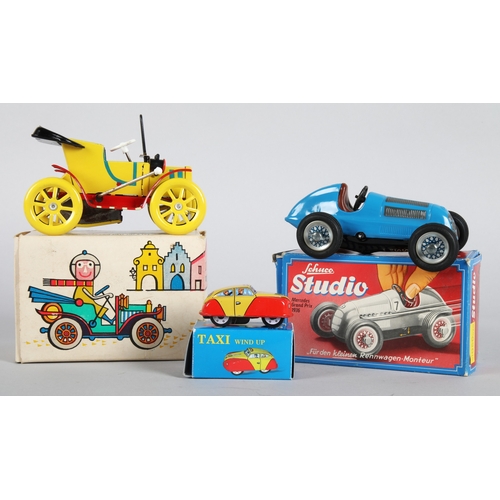 Collection of mechanical clockwork toy vehicles to include Three Schuco ...