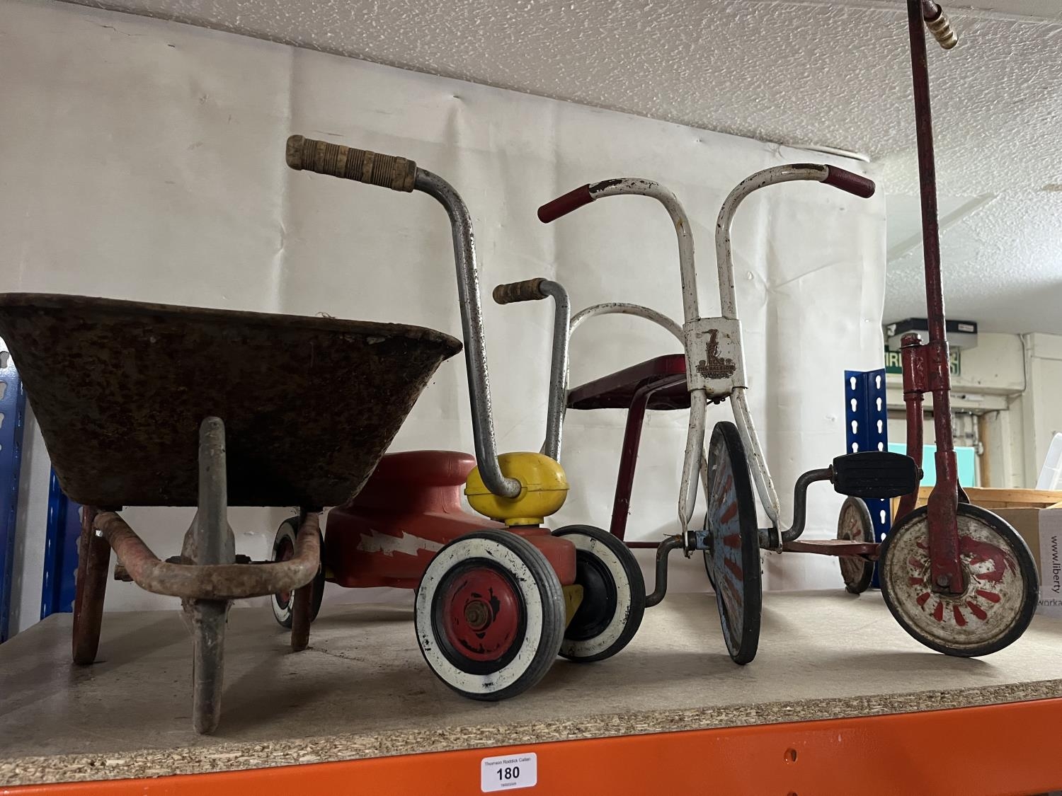 Raleigh child's bike, a scooter, a wheelbarrow, etc.