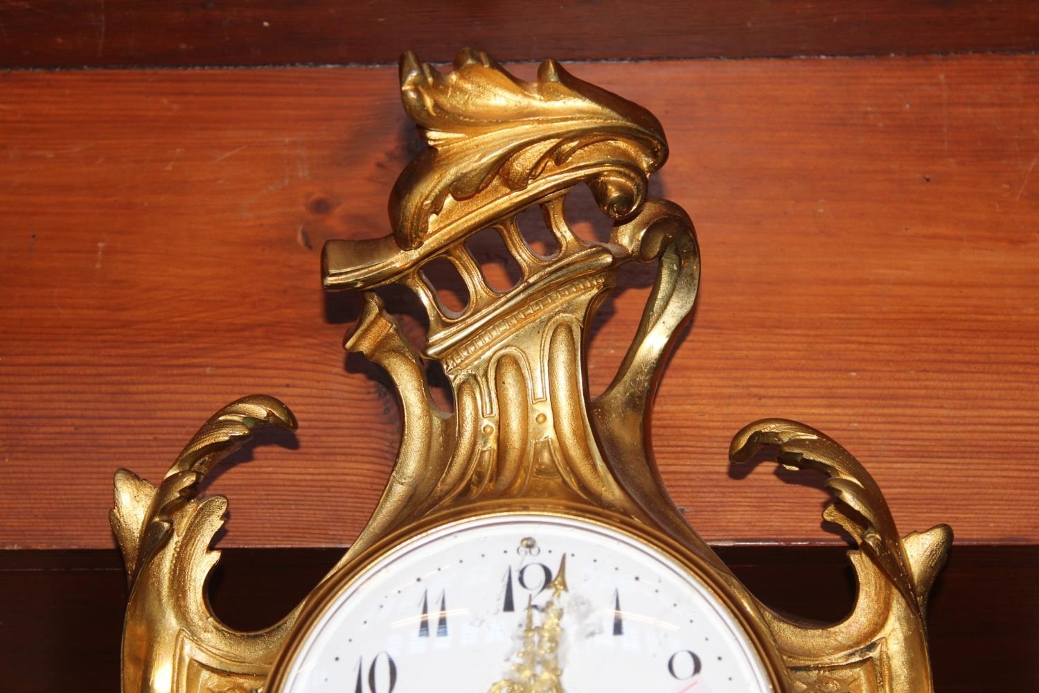 French gilt metal scroll wall clock, the works by F Marti of Paris ...