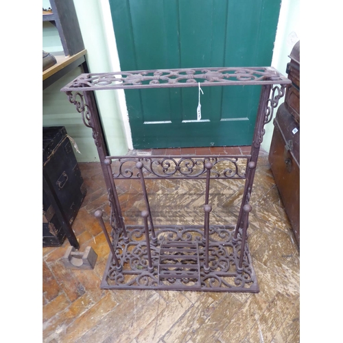 Ornate cast metal boot rack