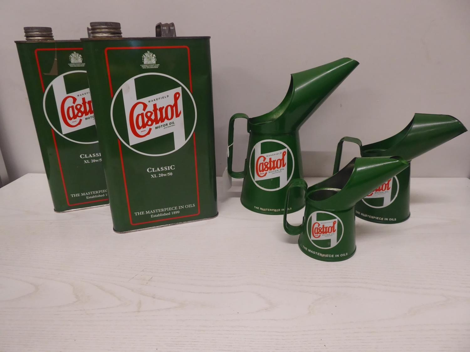 Castrol motor oil jugs and cans