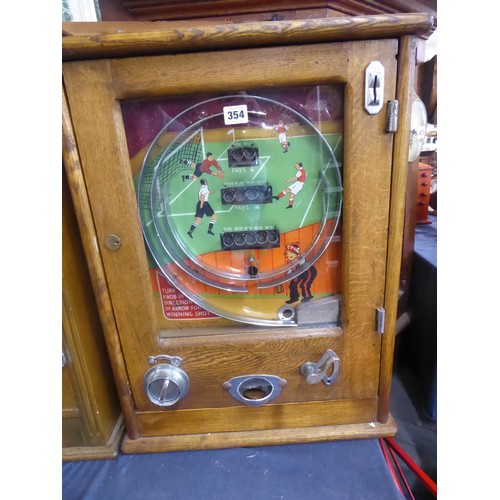 Mid 20thC oak cased penny slot machine - Whales, Redcar
