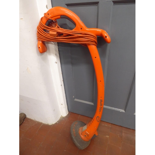 Sledge hammer, mattock, garden claw and Flymo strimmer (4)