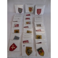 Post war German military cloth sleeve badges (40) and mechanics cap badge