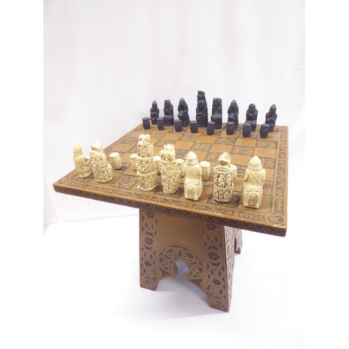 Carved wooden chess table with resin 'Lewis' chess set ( white rook ...