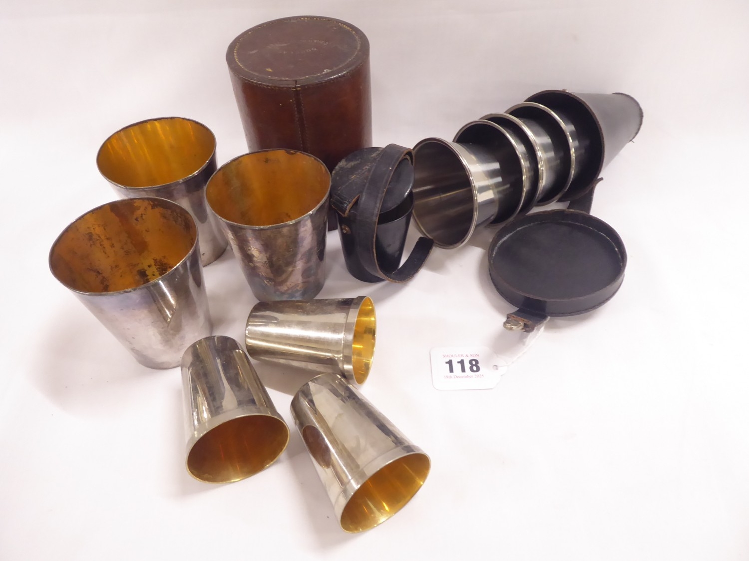 Leather cased set of stirrup cups (3)