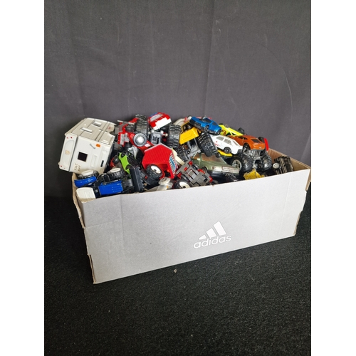 A large quantity of mixed branded toy cars.