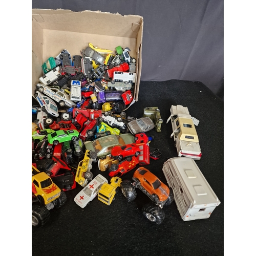 A large quantity of mixed branded toy cars.