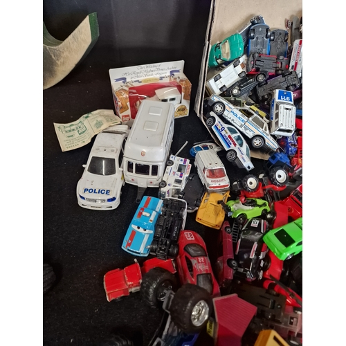 A large quantity of mixed branded toy cars.