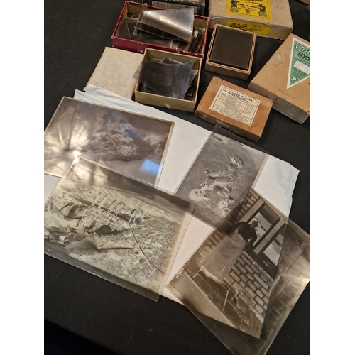 A large collection of vintage uaed glass plate films. Includes Velox ...