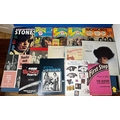 A collection of rock and roll memorabilia, Rolling Stones poster ...