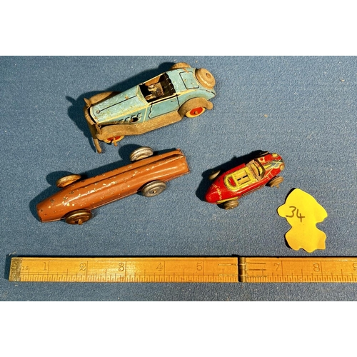 A collection of 3 early tinplate racing cars