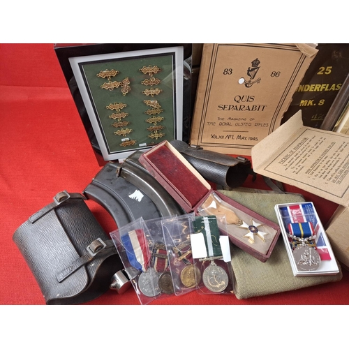 Collection of various military items