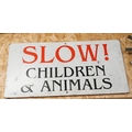 Sign 'Slow Children and Animals'