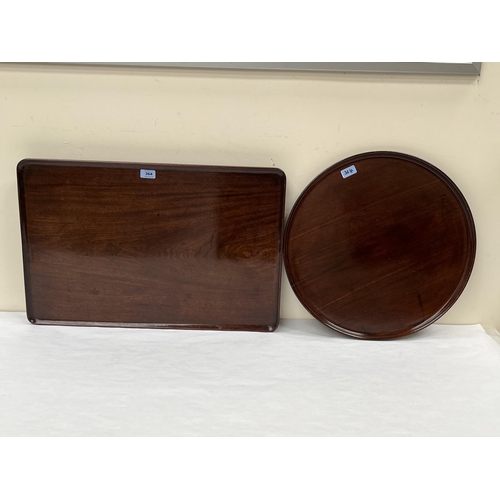 Two 19th century mahogany table tops, 27' wide; 20' diam.