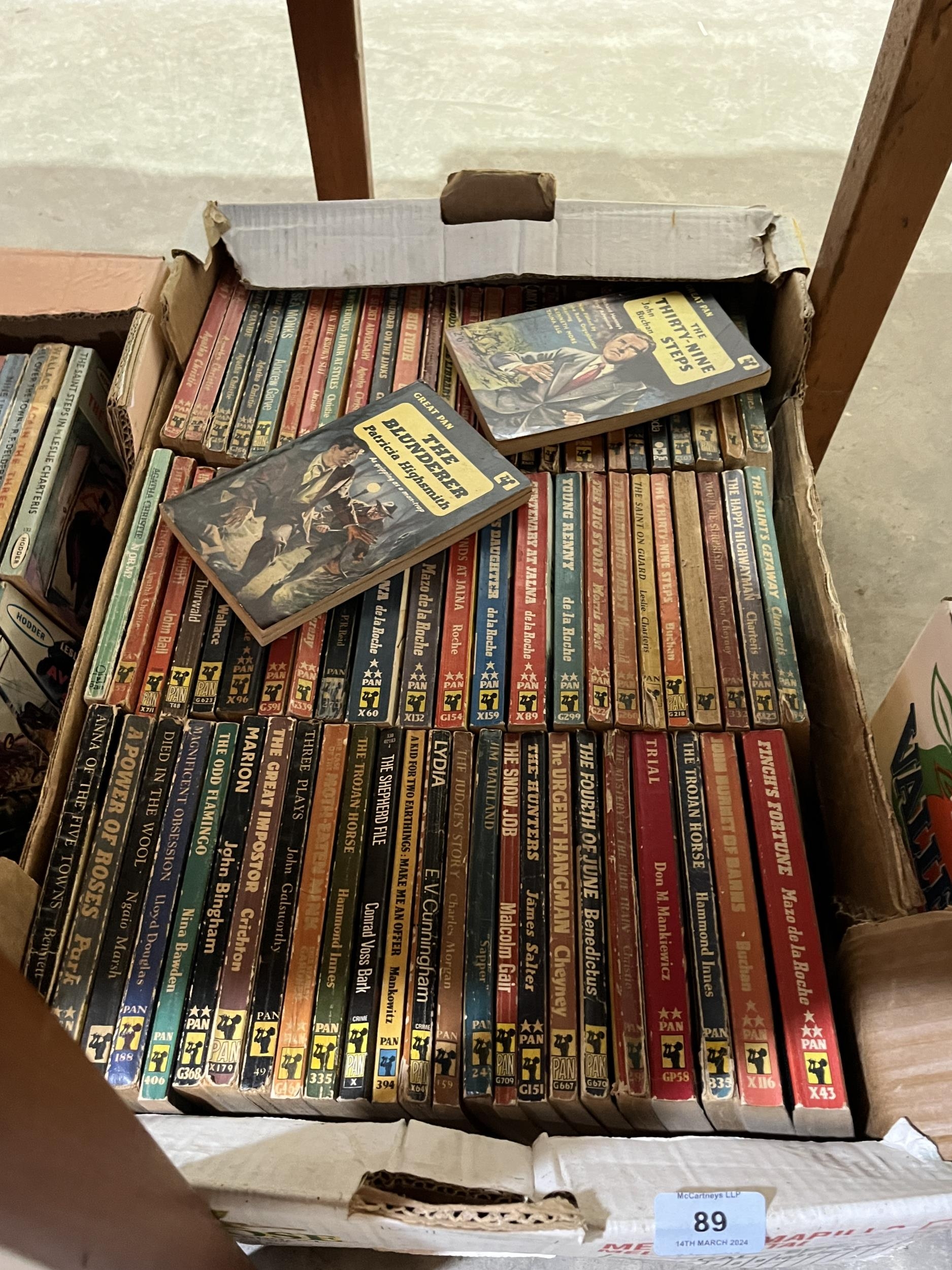 Two boxes of books, vintage Hodder and Pan paperbacks.