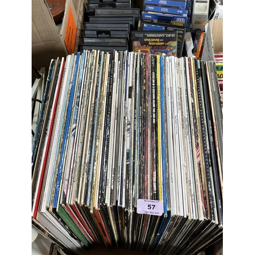 A box of vinyl albums.