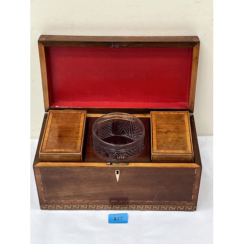 A Victorian mahogany, inlaid and satinwood banded tea caddy. 12" wide.