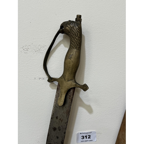 An Indian Tulwar type sabre with wood and brass mounted scabbard. 36" long.
