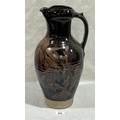A Shepherd"s Well Pottery jug by David Eeles. Impressed marks, 17" high.