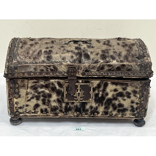 A 19th century domed chest, covered in brass nail studded hyena skin ...