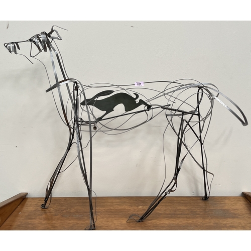 RACHEL RICKETTS. BRITISH Bn. 1957 A metal studio sculpture of a dog. 42 ...