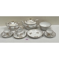 An early 19th century New Hall pattern 1141 part service of ten pieces