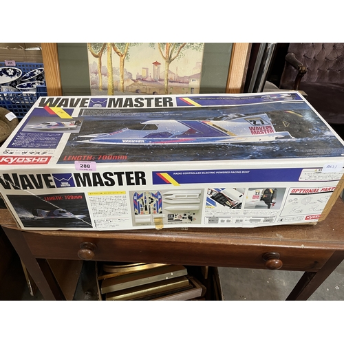A Kyosho Wavemaster radio controlled racing boat. 70cm long