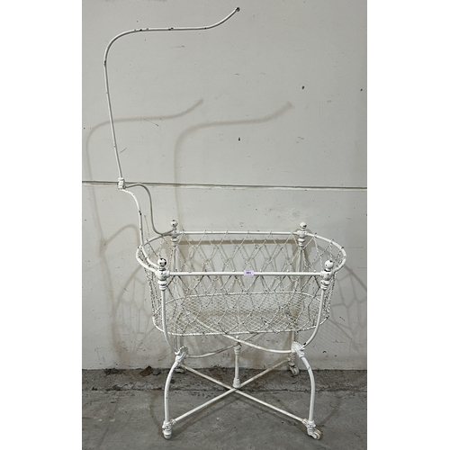 A 19th century metal cradle