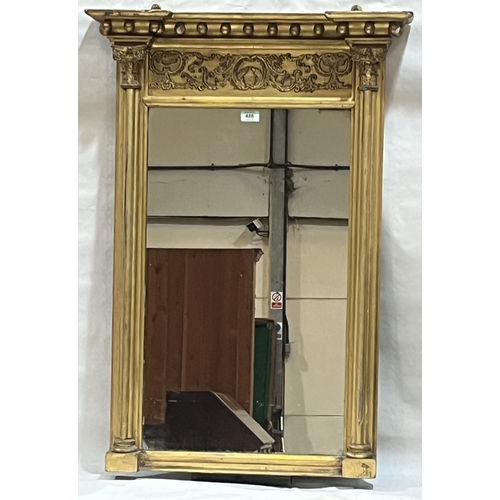 A Regency giltwood and gesso pier looking glass with ball applied ...