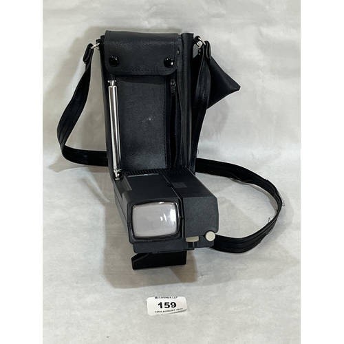 A Sinclair Microvision MTVIB miniature television with slip case