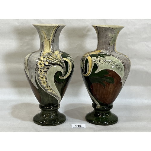 A pair of Faience de Permerend inverted baluster vases decorated in Art ...