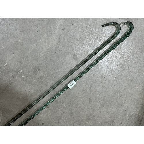 Two 19th century green glass walking cane friggers. 39½in long and shorter