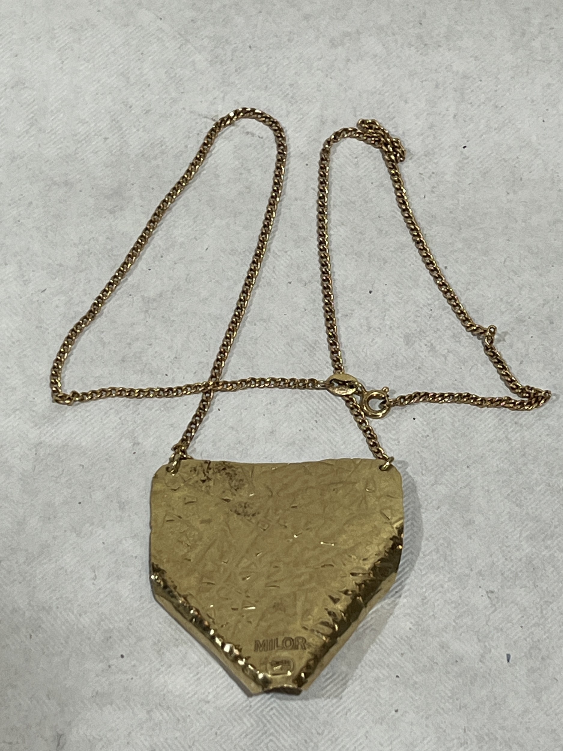 A 9ct modernist design pendant on necklet chain. 6.2g