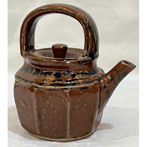 Mike Dodd (born 1943) small stoneware faceted teapot, tenmoku glaze ...